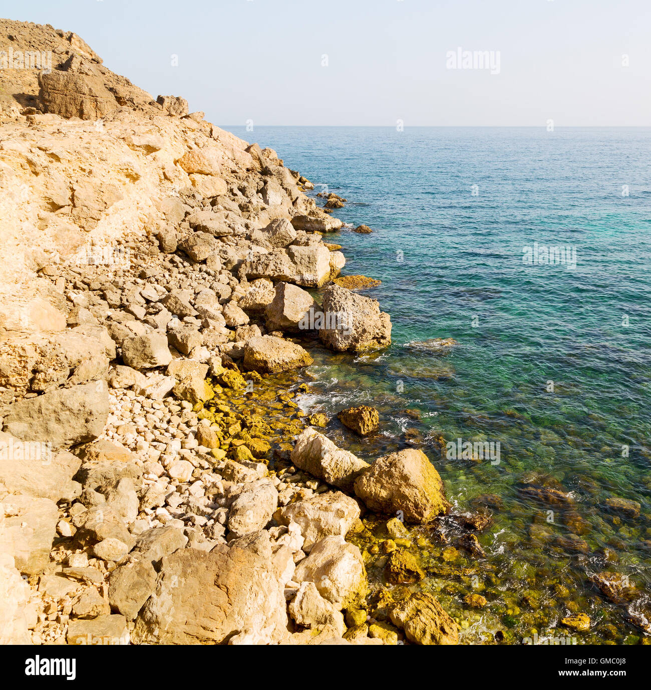 near sandy beach sky and mountain in oman arabic sea the hill Stock ...