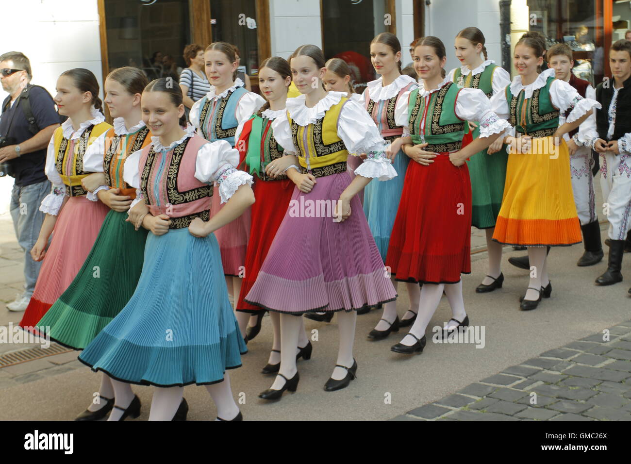 Slovak folklore ensemble during a parade through the historical centre ...