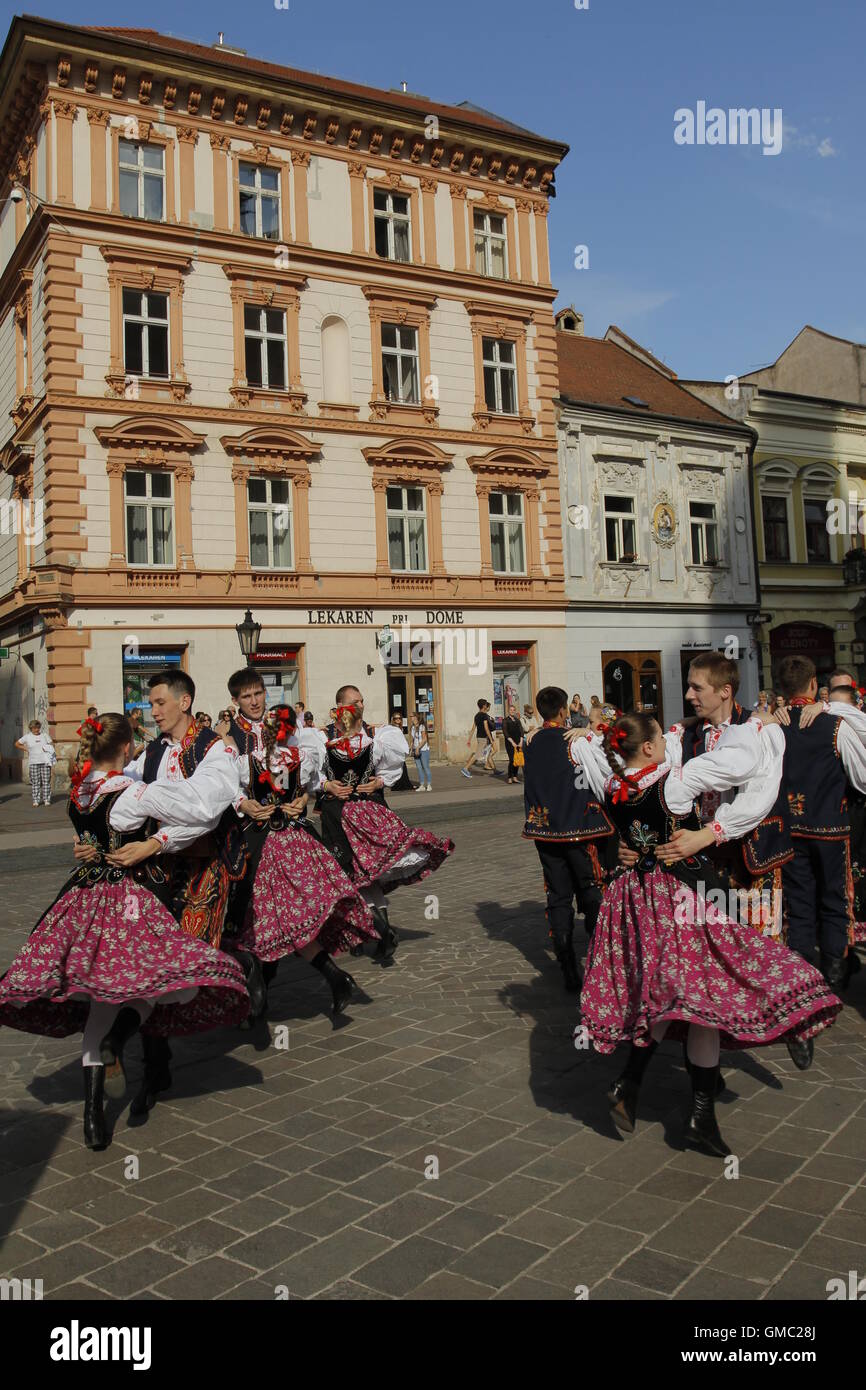 Slovak folklore ensemble dancing in the historical centre of Kosice ...