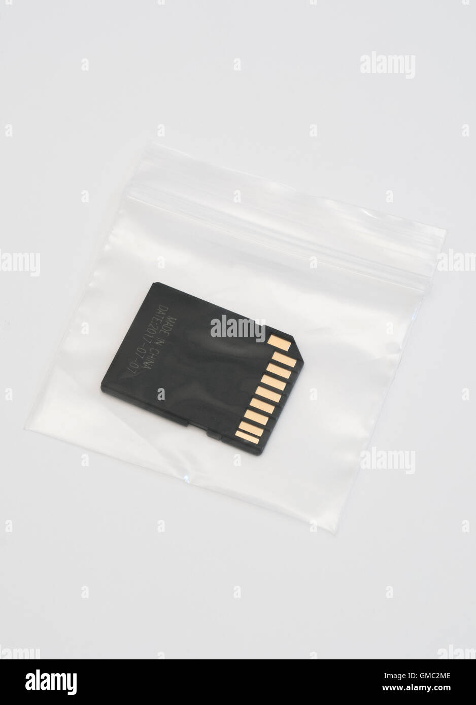 SD memory card in transparent bag Stock Photo - Alamy
