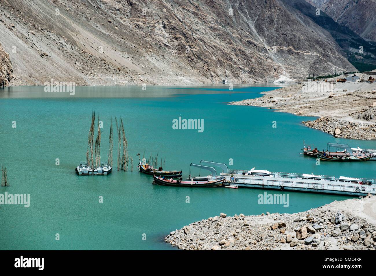 Abandoned ferry boats and pontoons on Attabad lake in the Gojal valley ...