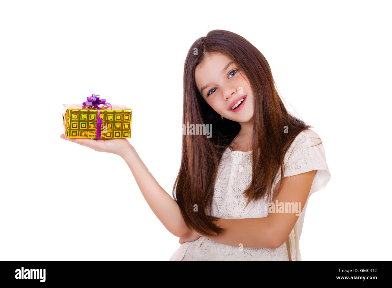 Happy little girl with gift box, studio on white background Stock Photo ...