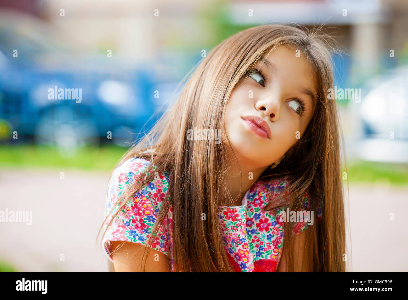 Beautiful Happy little girl outdoors Stock Photo - Alamy