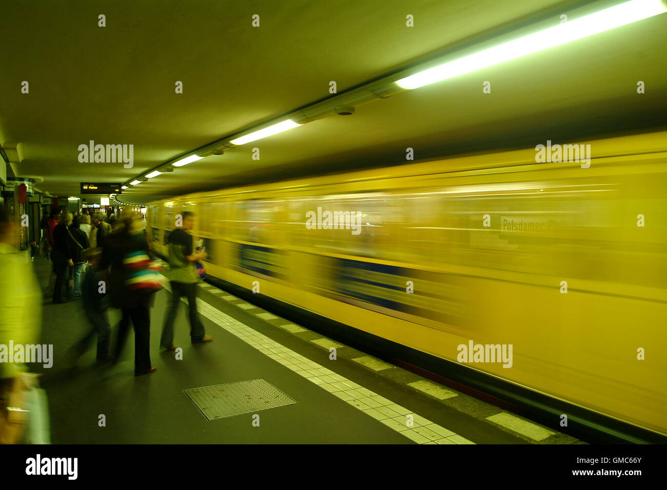 yellow berlin metro train Stock Photo - Alamy