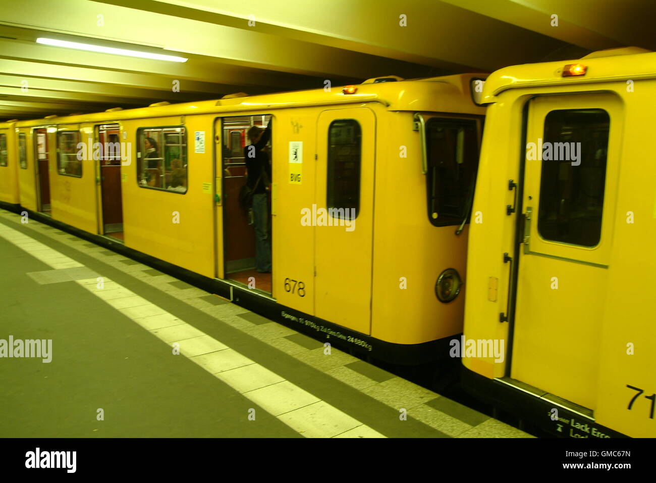 yellow berlin metro train Stock Photo - Alamy