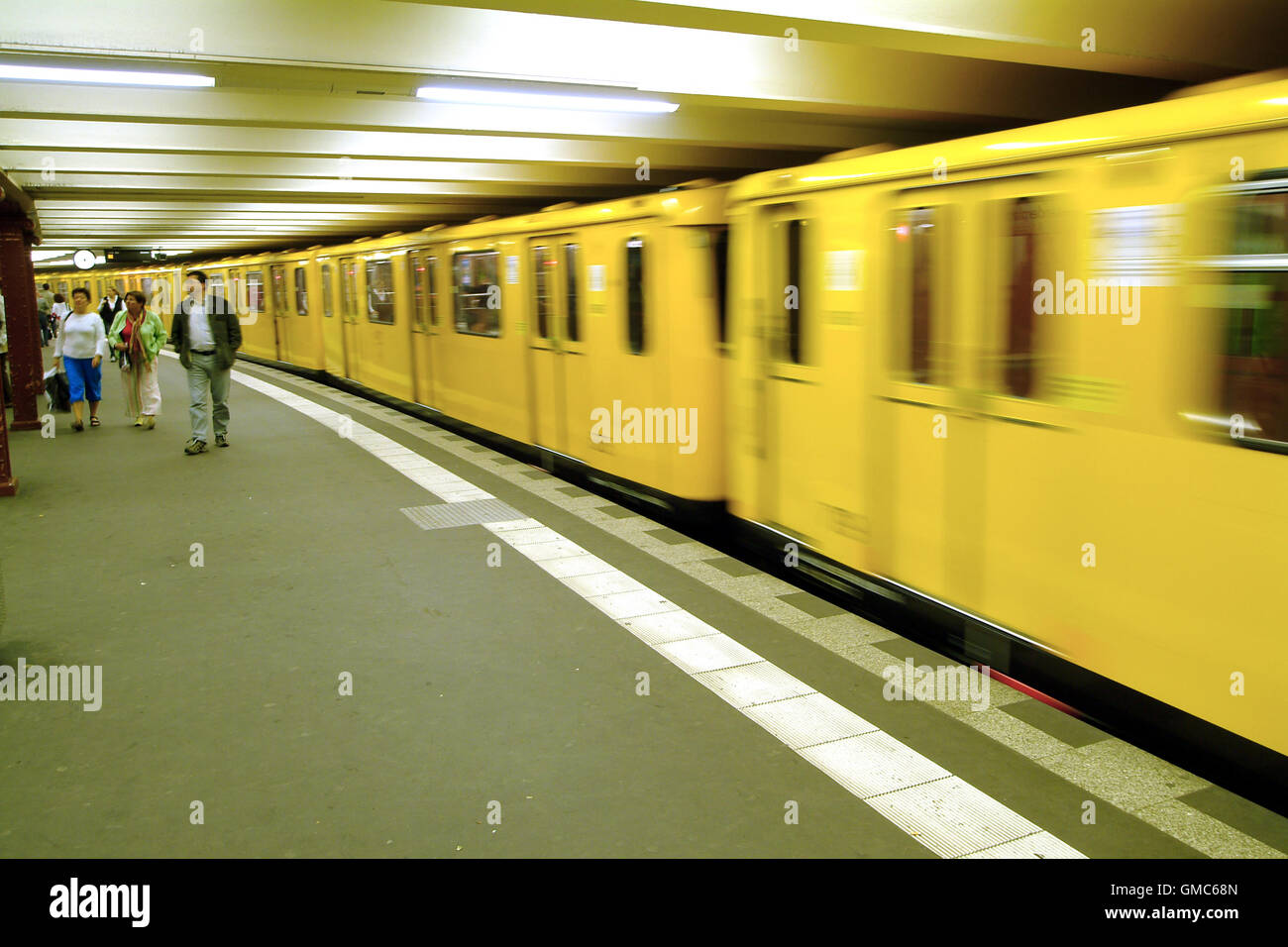 yellow berlin metro train Stock Photo - Alamy