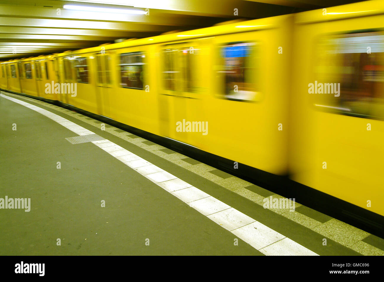 Berlin metro passing train station hi-res stock photography and images ...