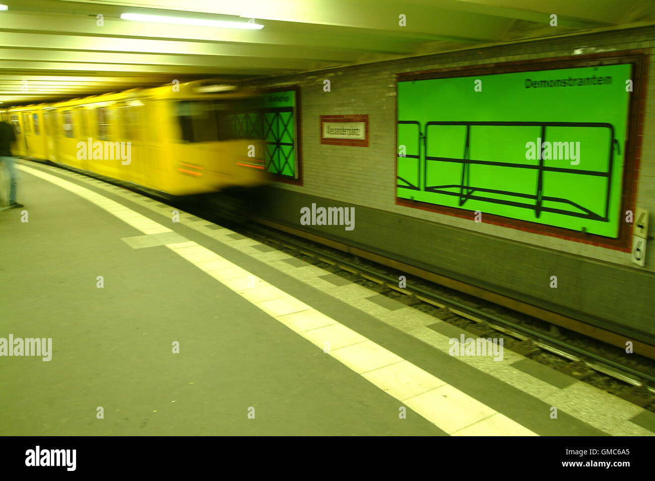 yellow berlin metro train Stock Photo - Alamy