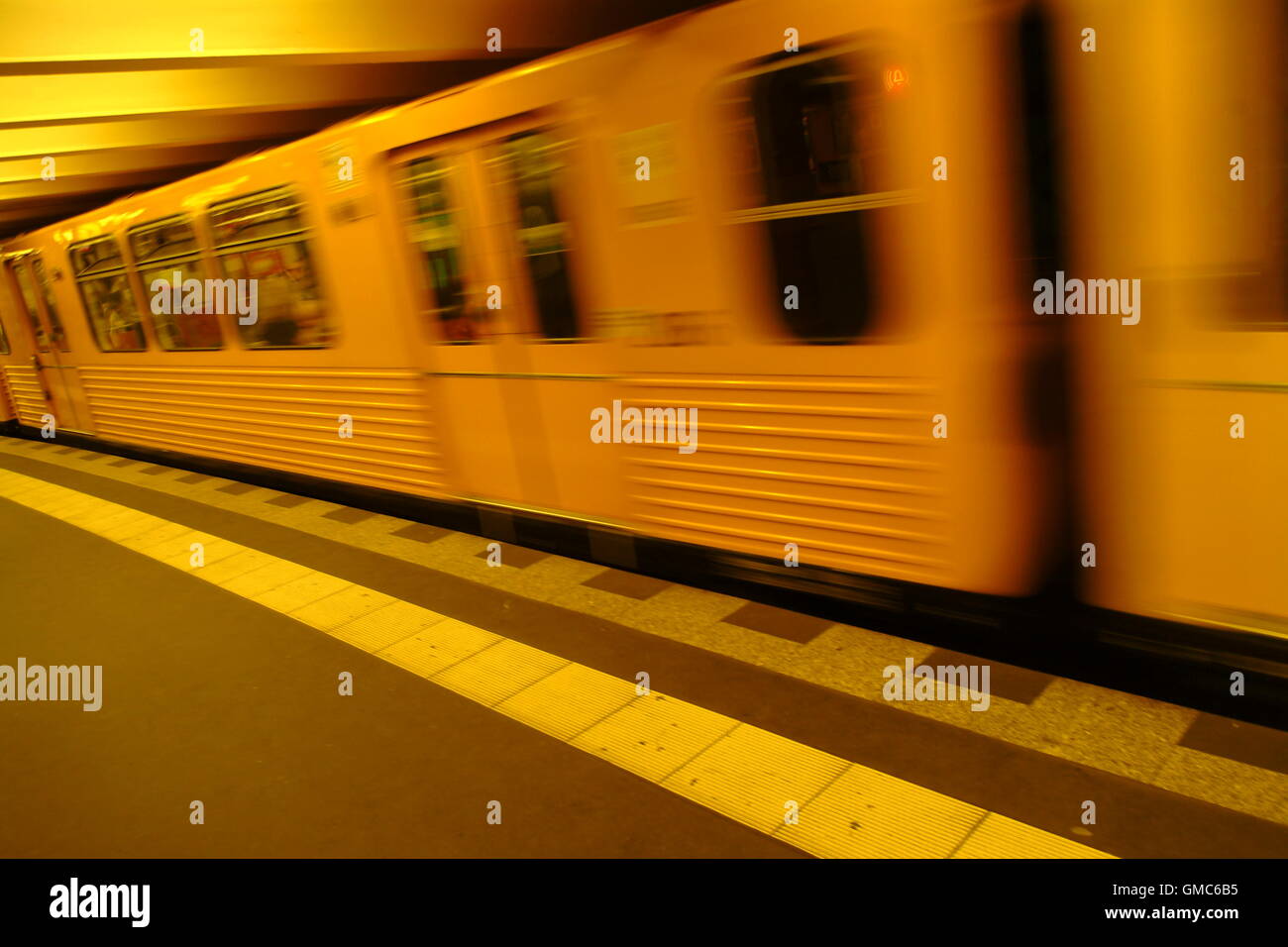 yellow berlin metro train Stock Photo - Alamy