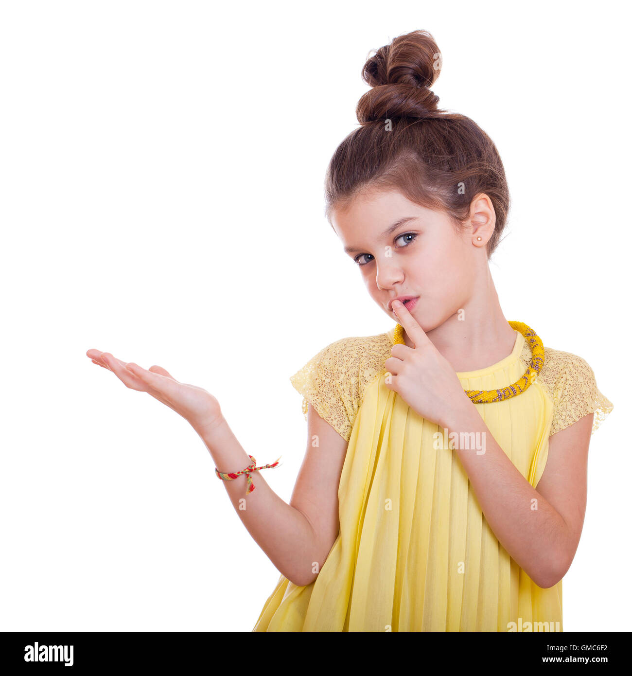Beautiful youth little girl presenting copy space, studio on white ...
