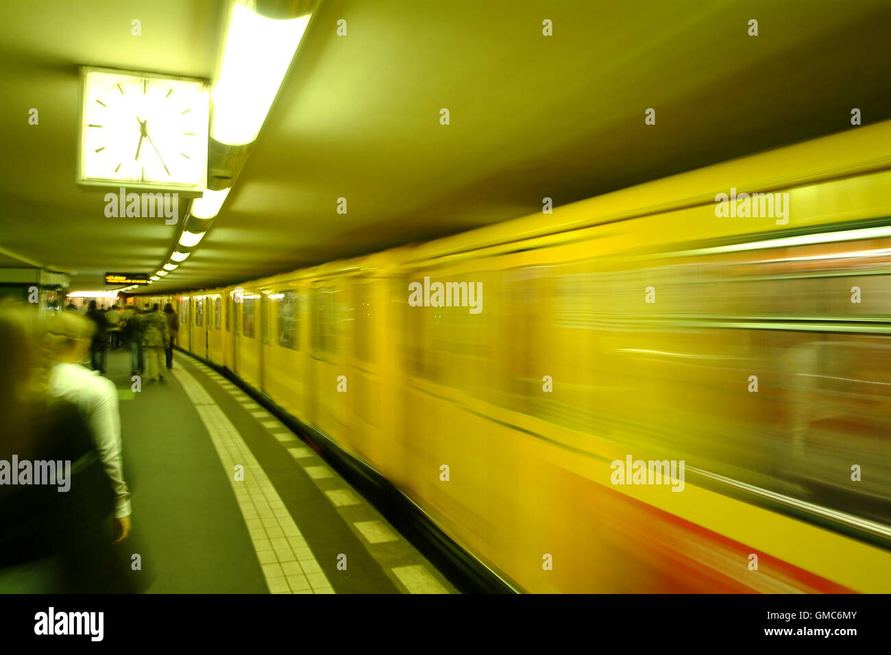 yellow berlin metro train Stock Photo - Alamy