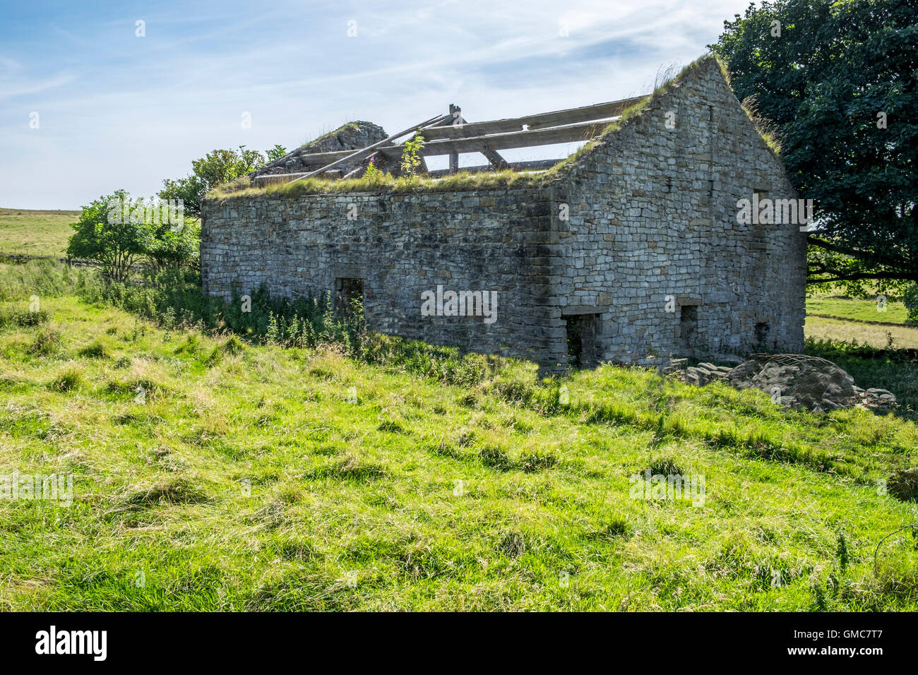 derelict old farm house in the back of beyond with no roof or windows ...