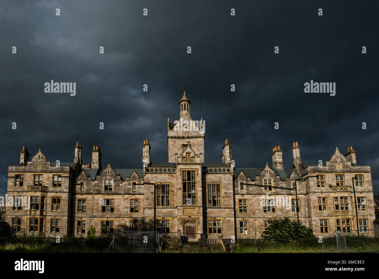 Stormy sky over the imposing Denbigh Asylum, Denbigh, Denbighshire ...