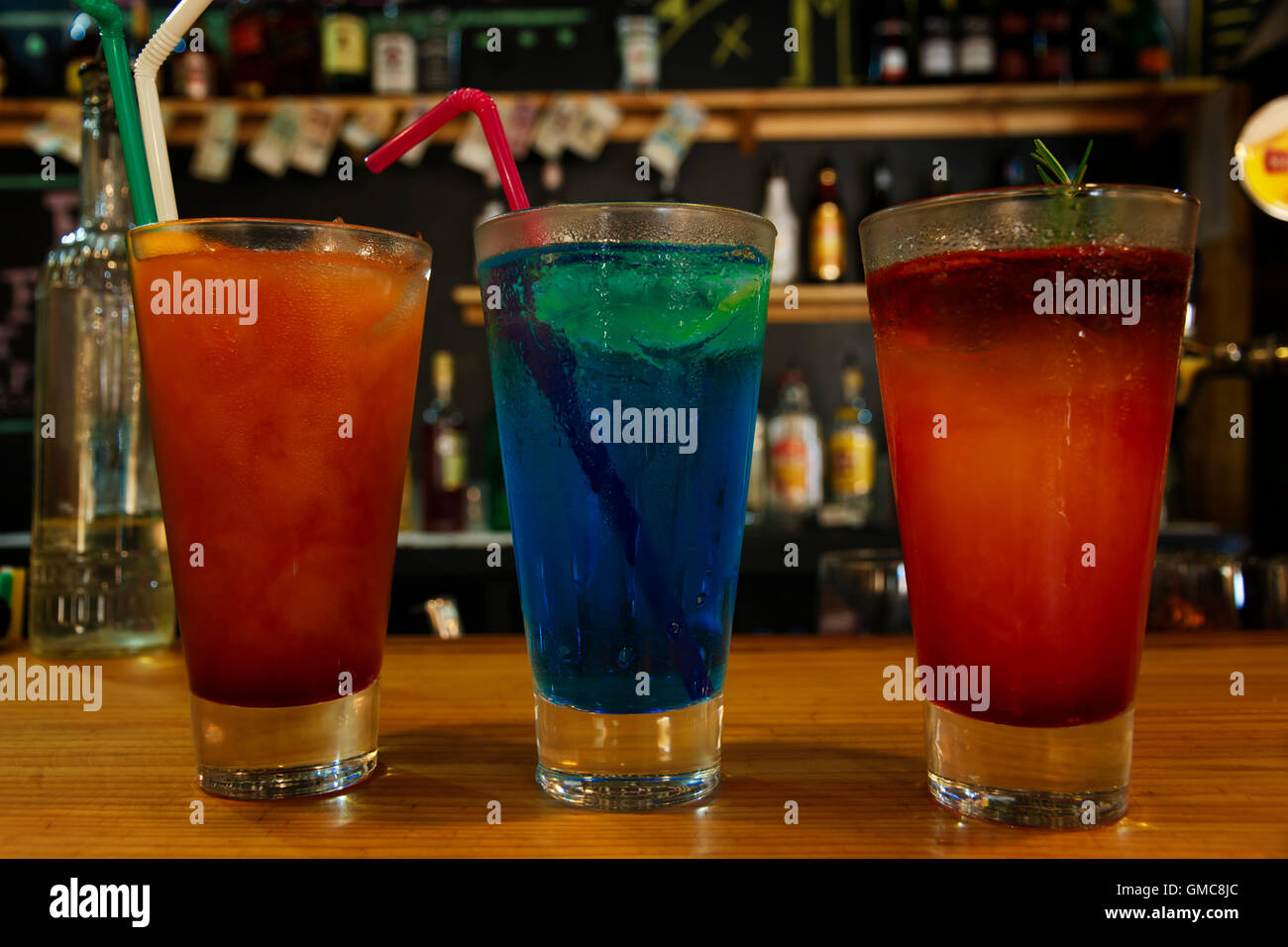 colored cocktails on the bar Stock Photo - Alamy