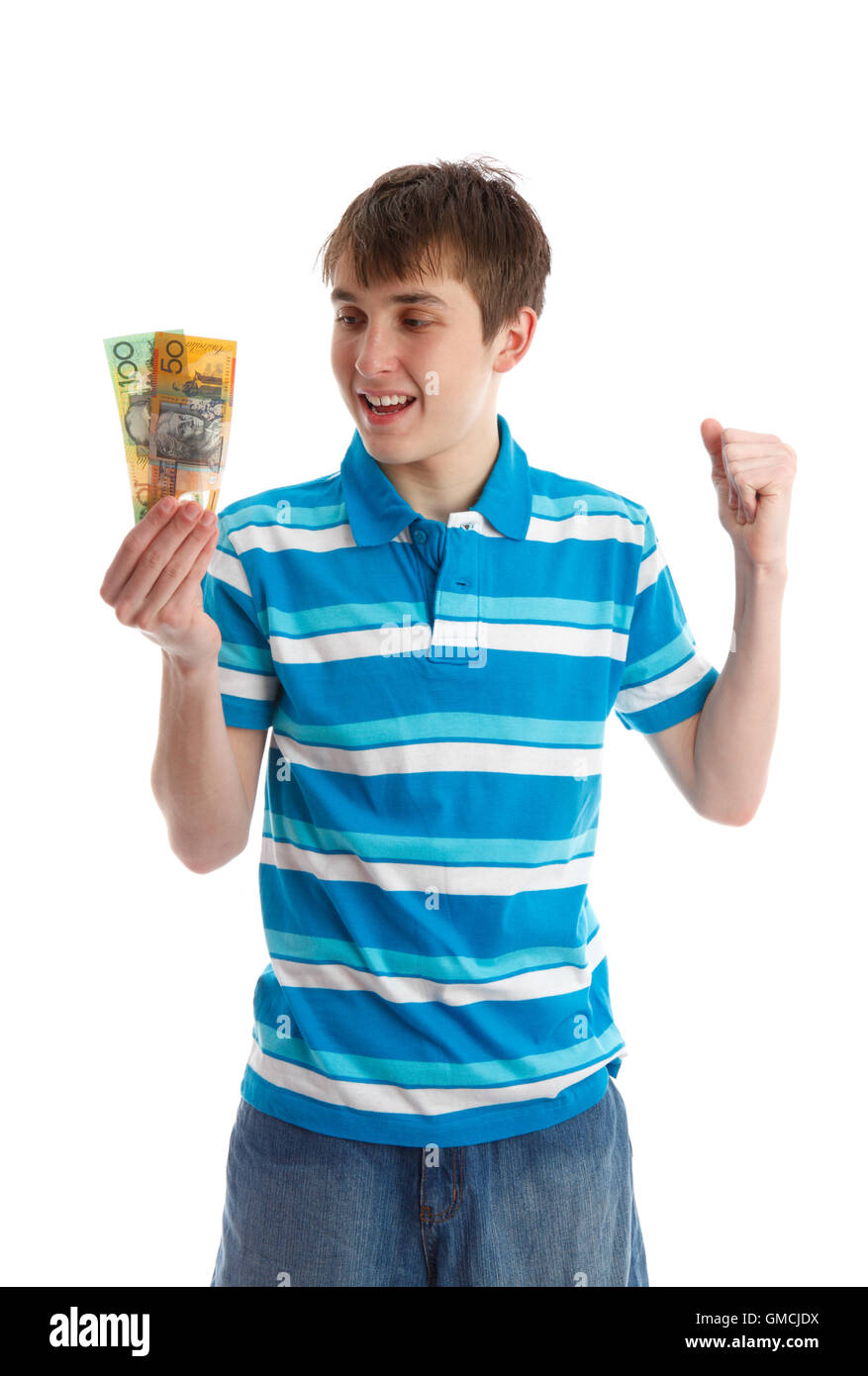 Teenage boy holding money Stock Photo - Alamy