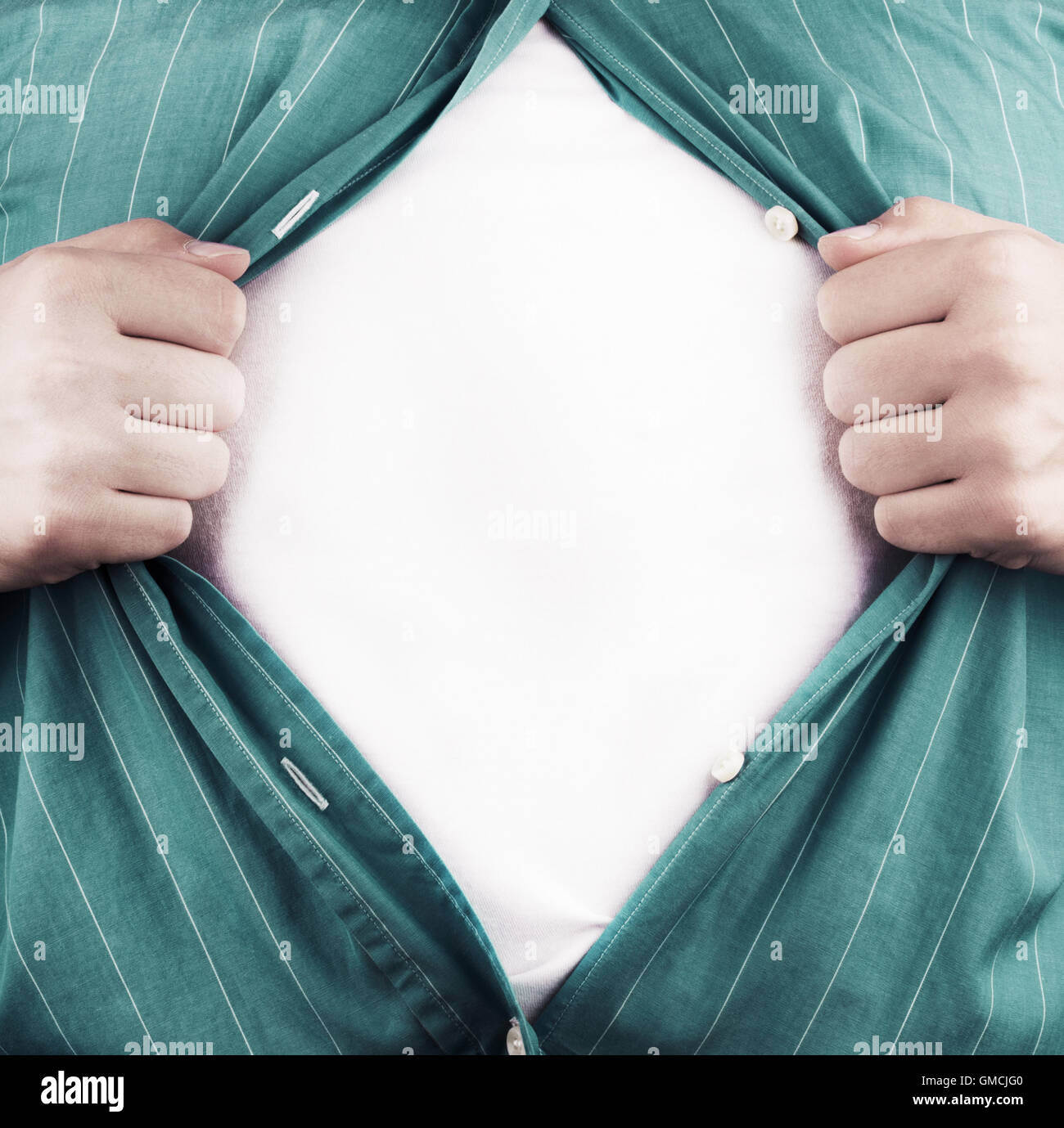 Business man tearing off his shirt Stock Photo - Alamy
