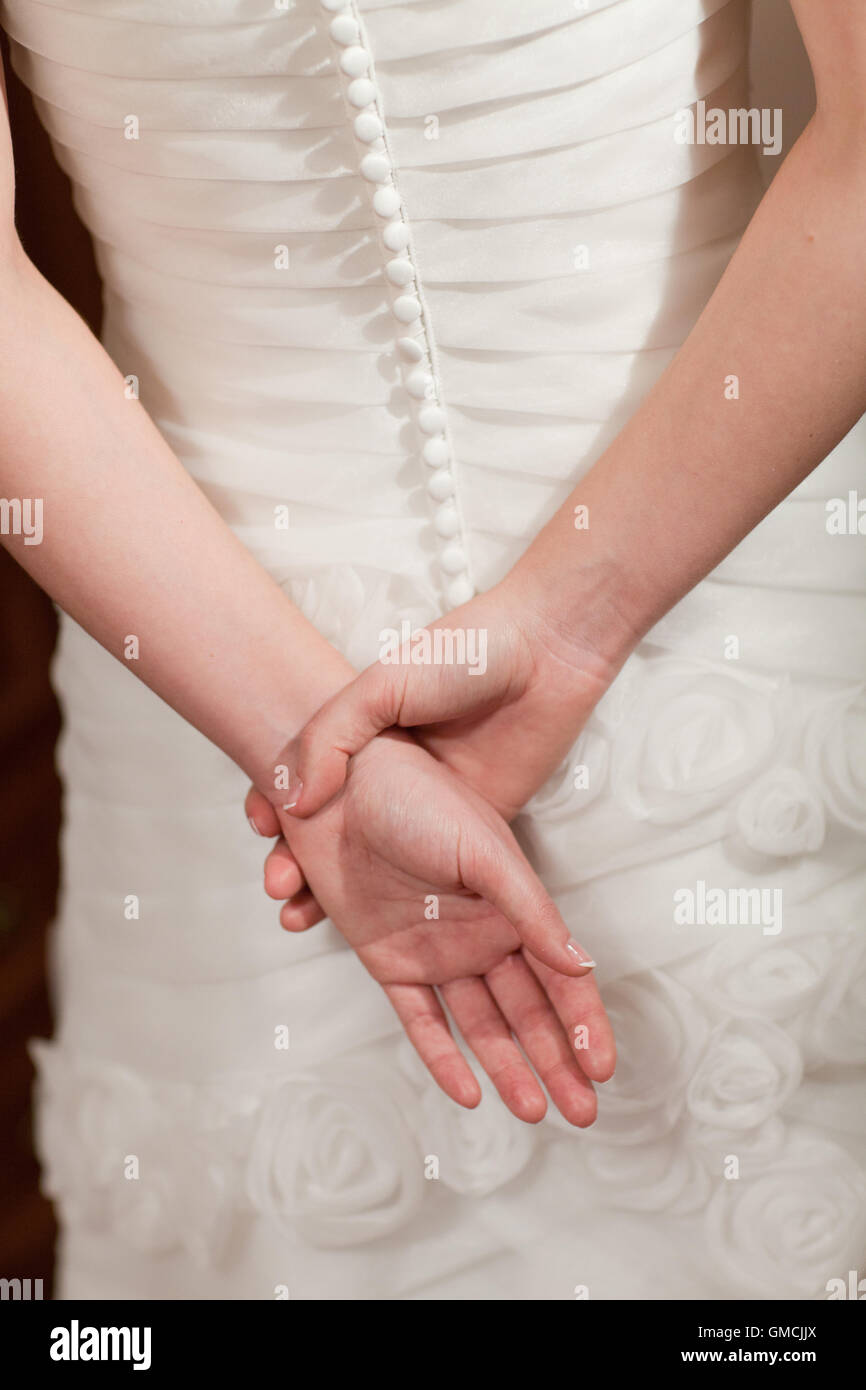back of the wedding dress and hands Stock Photo - Alamy