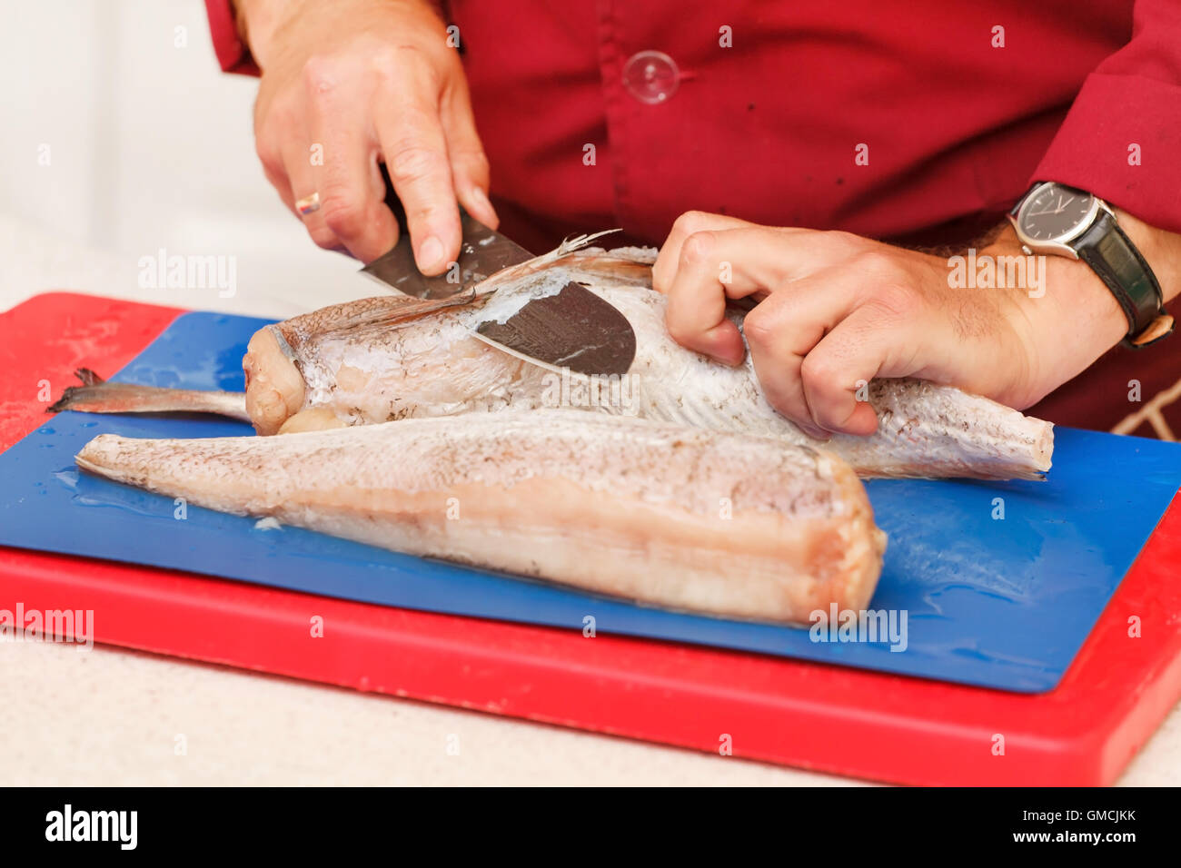 chef in restaurant slicing raw fish Stock Photo - Alamy
