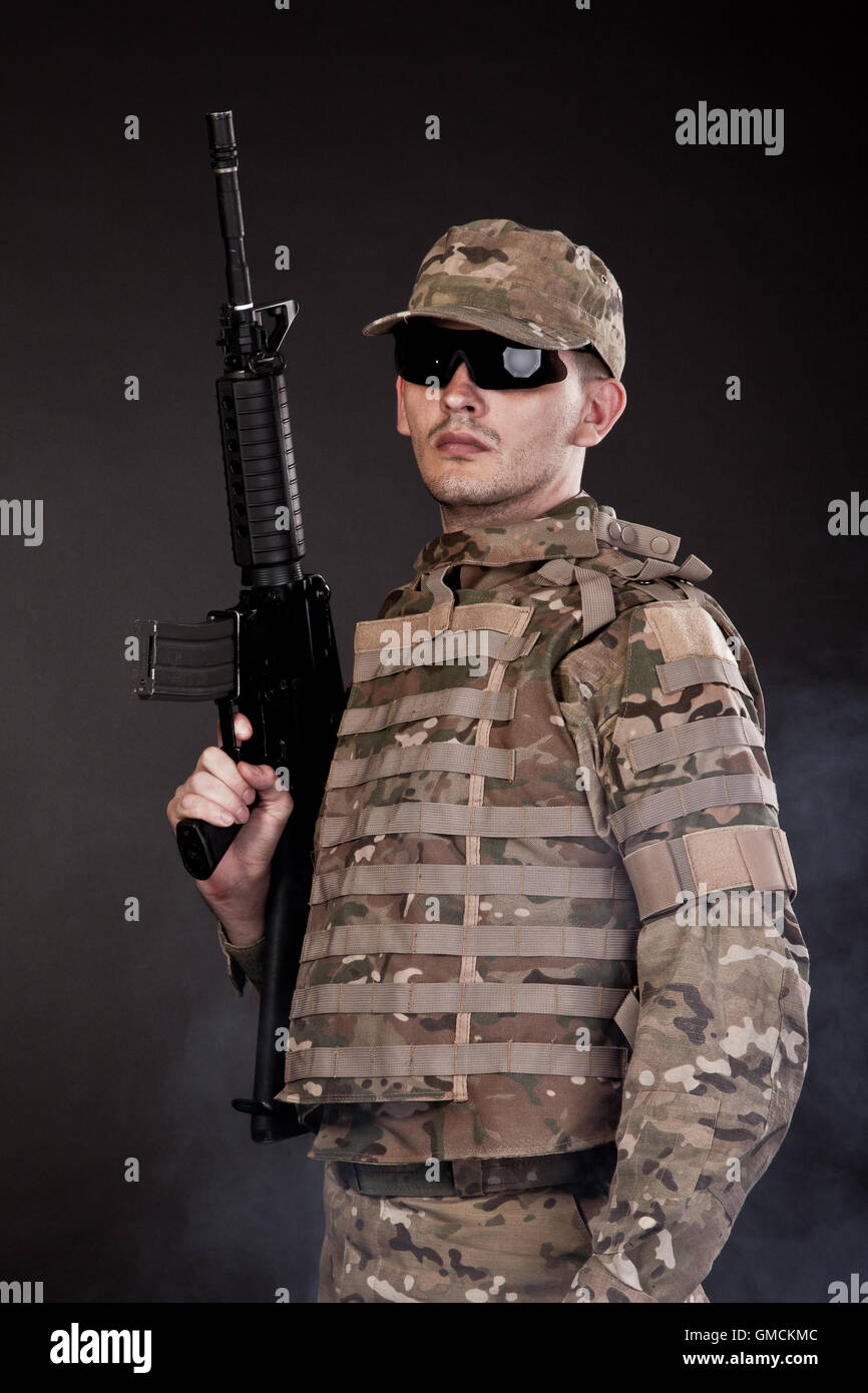 Modern soldier with rifle Stock Photo - Alamy