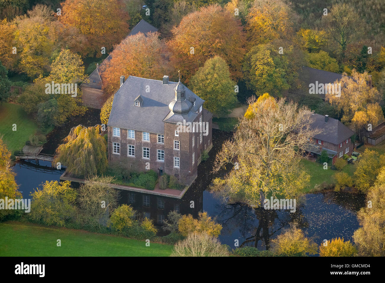 Aerial view, moated castle, Haus Voerde in autumnal park, Voerde, Ruhr ...