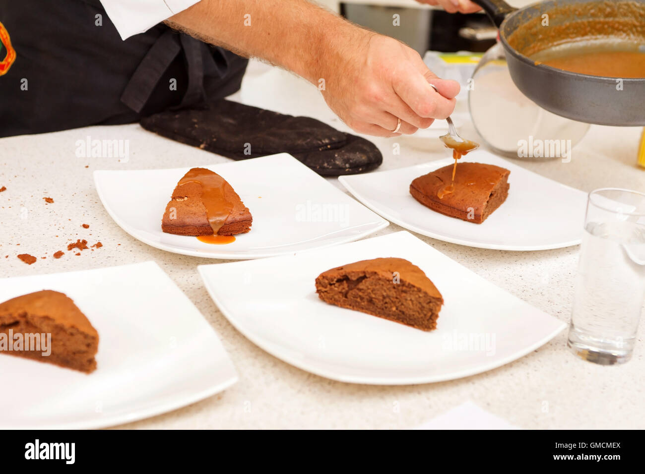 Chocolate Cake With Caramel Sauce Stock Photo Alamy