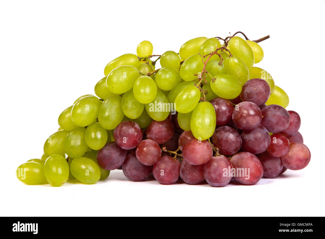 Bunch of White and Red Grapes laying isolated Stock Photo - Alamy