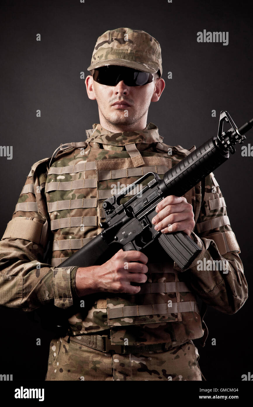 Modern soldier with rifle Stock Photo - Alamy