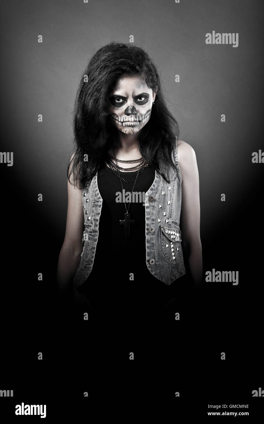 Young woman in day of the dead mask skull. Halloween face art Stock ...