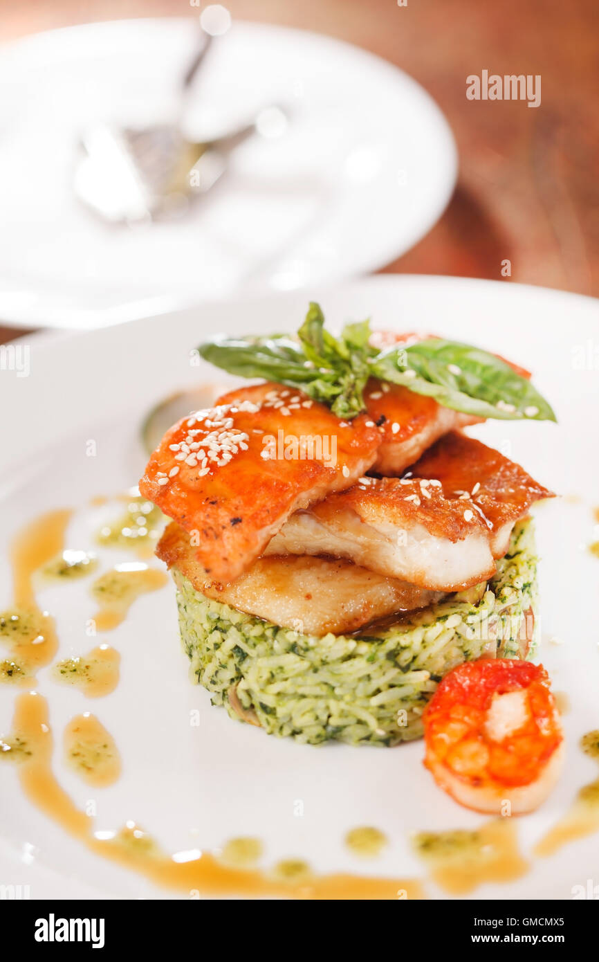 fish with rice and vegetables Stock Photo - Alamy