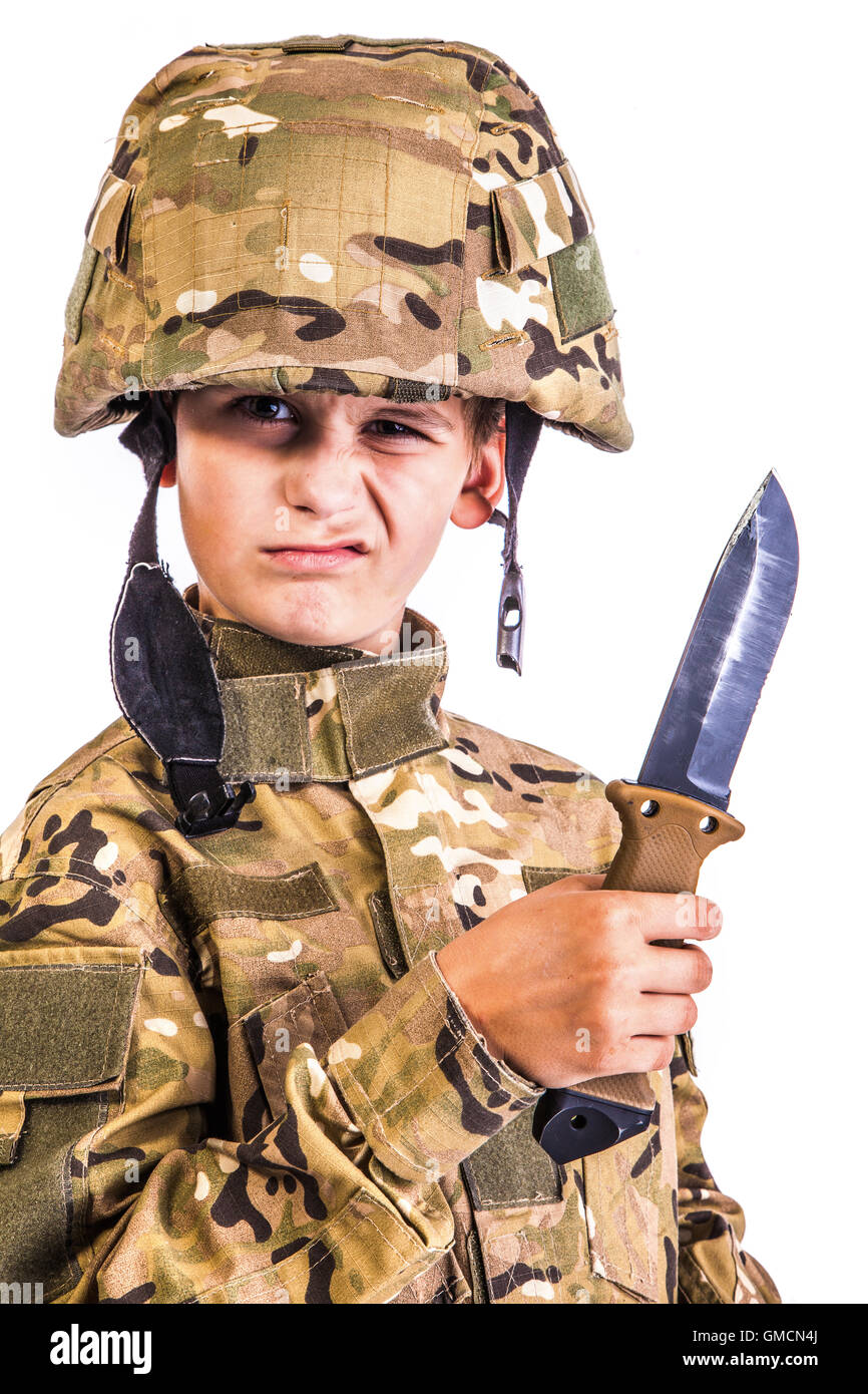 Young soldier with knife Stock Photo - Alamy