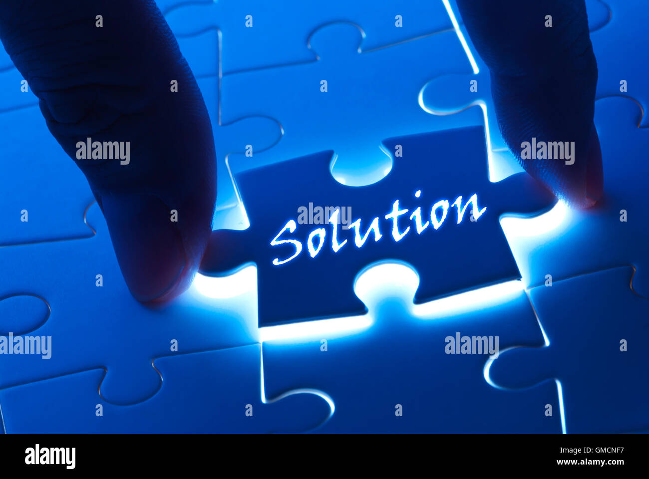 Solution word on puzzle piece Stock Photo - Alamy