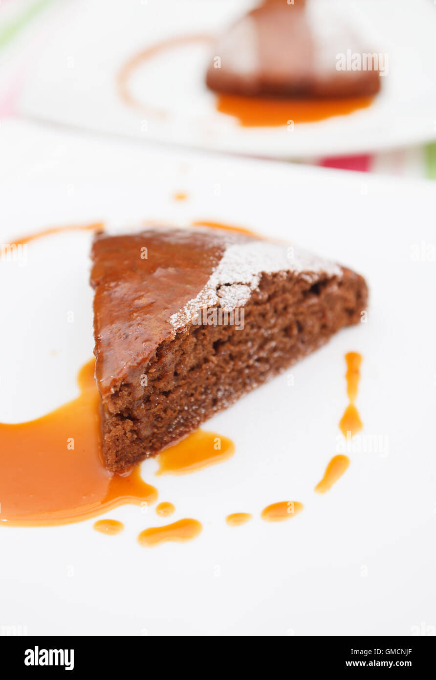 Chocolate Cake With Caramel Sauce Stock Photo Alamy