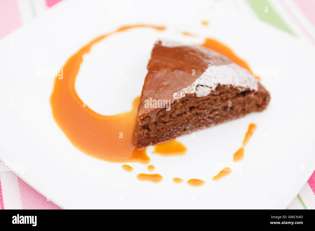chocolate cake with caramel sauce Stock Photo - Alamy