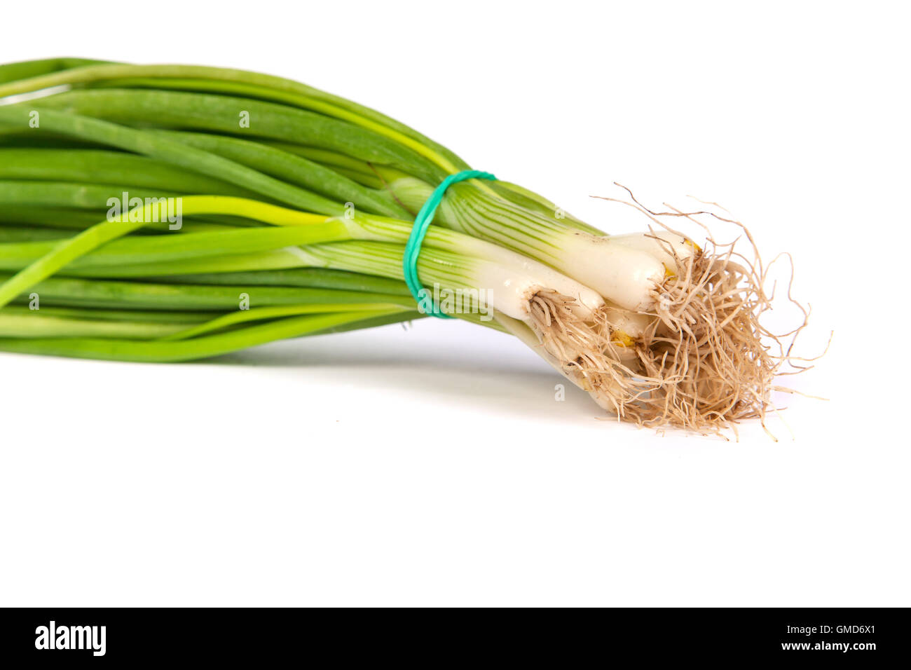 Fresh scallions isolated on white Stock Photo - Alamy
