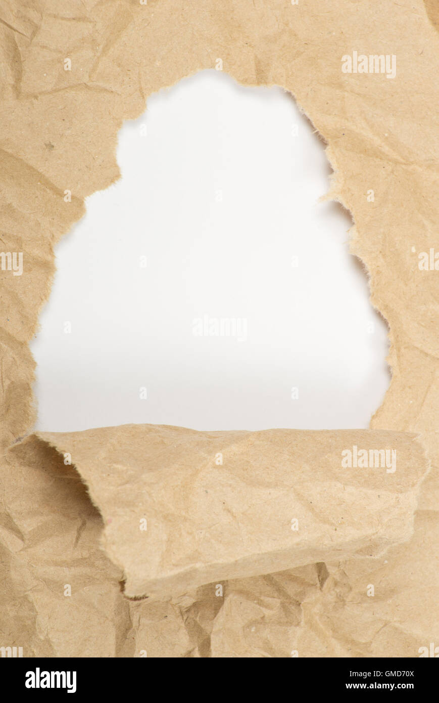 ripped white paper against a white background Stock Photo - Alamy