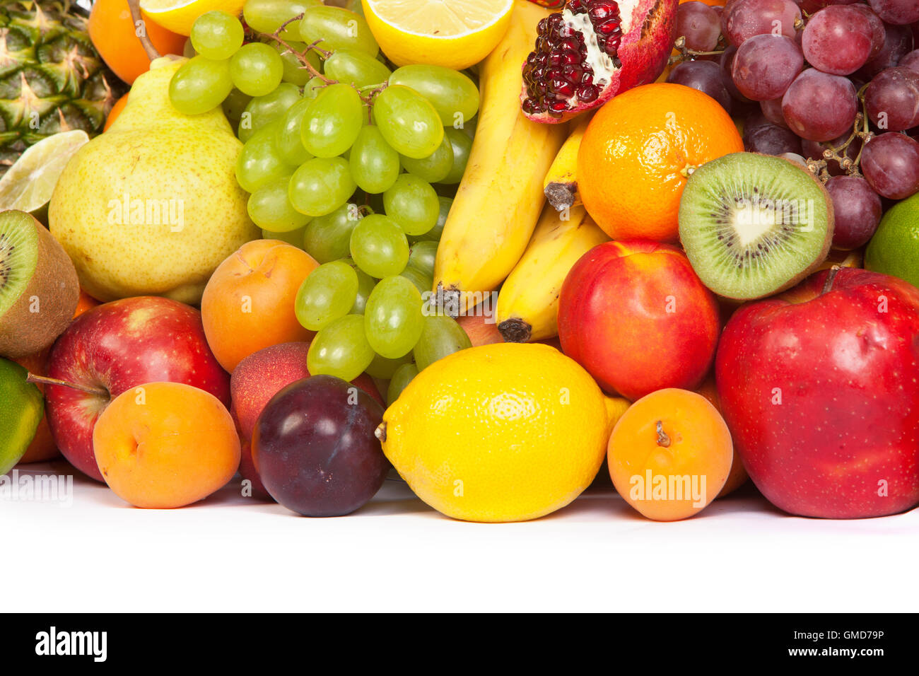 Huge group of fresh fruits isolated on a white Stock Photo - Alamy