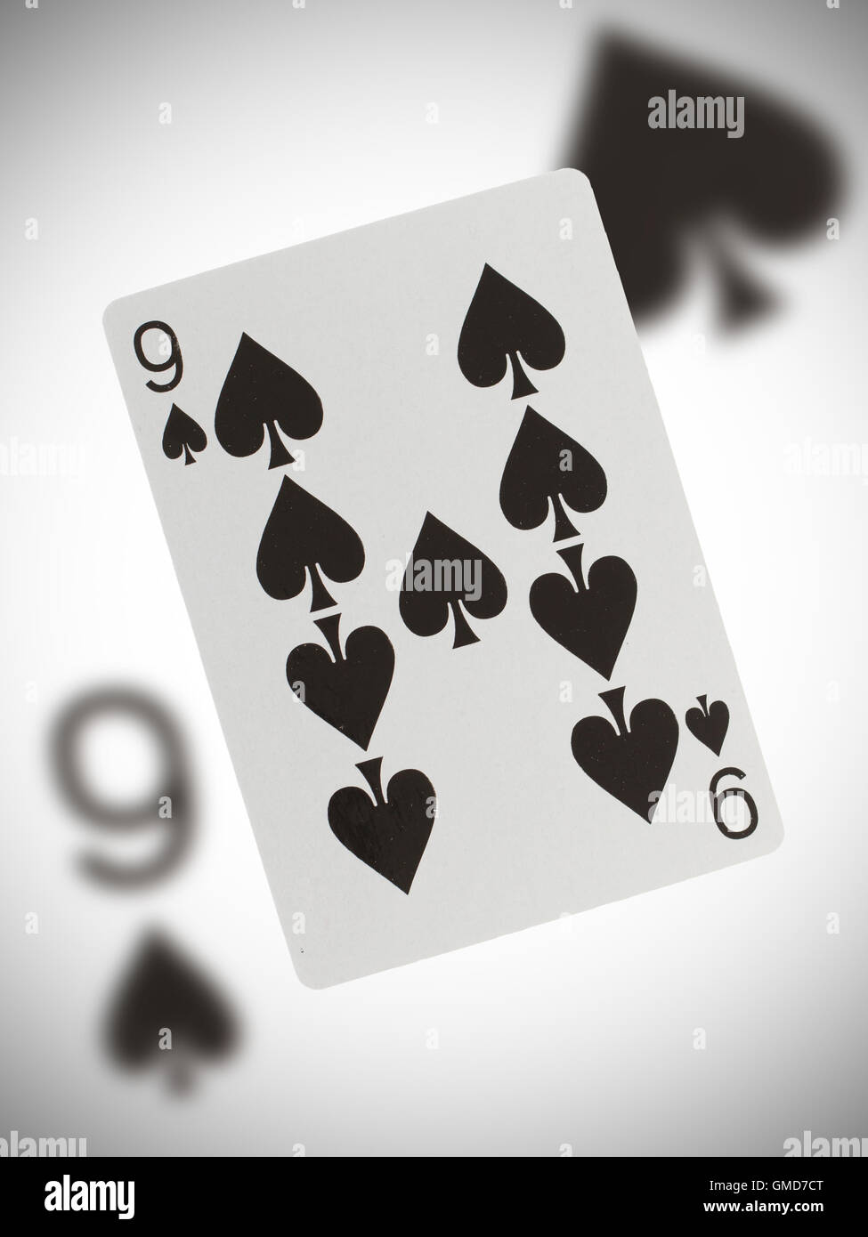 Playing card, nine of spades Stock Photo - Alamy