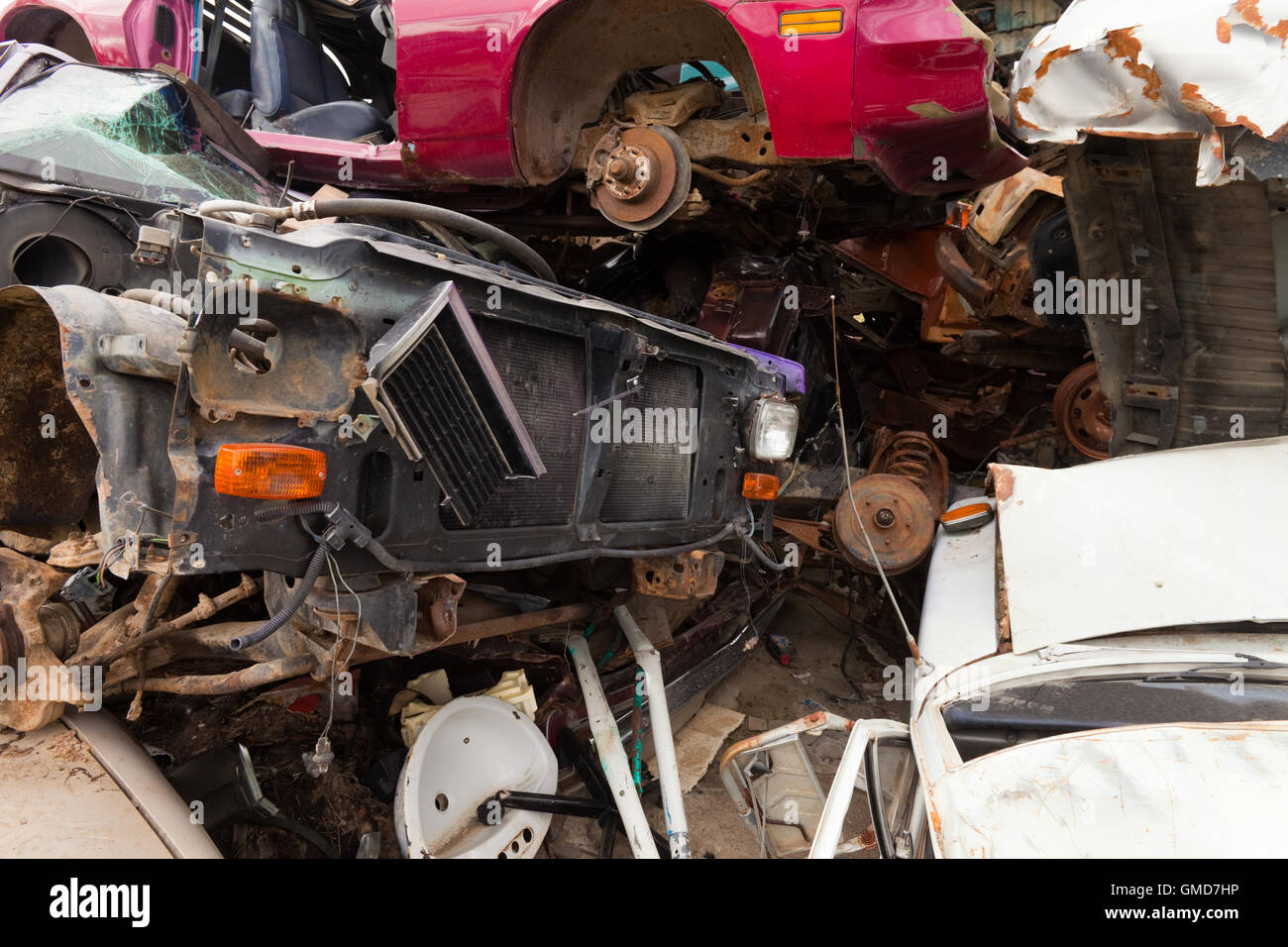 Vehicles rust on scrapyard Stock Photo - Alamy