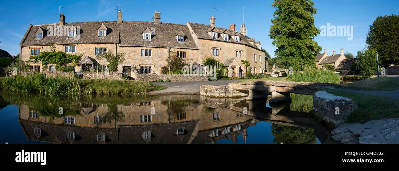 The river Eye flows through the Cotswold village of Lower Slaughter an ...