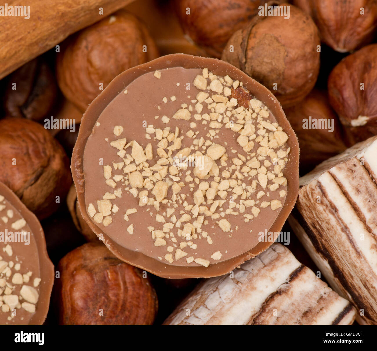 Closeup of coffee beans, cinnamon and nuts Stock Photo - Alamy