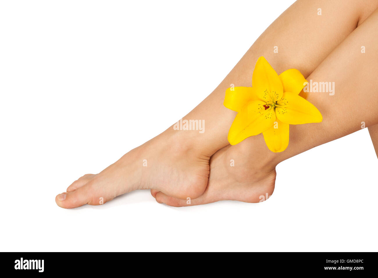 Beautiful woman legs with flower , isolated on white Stock Photo - Alamy