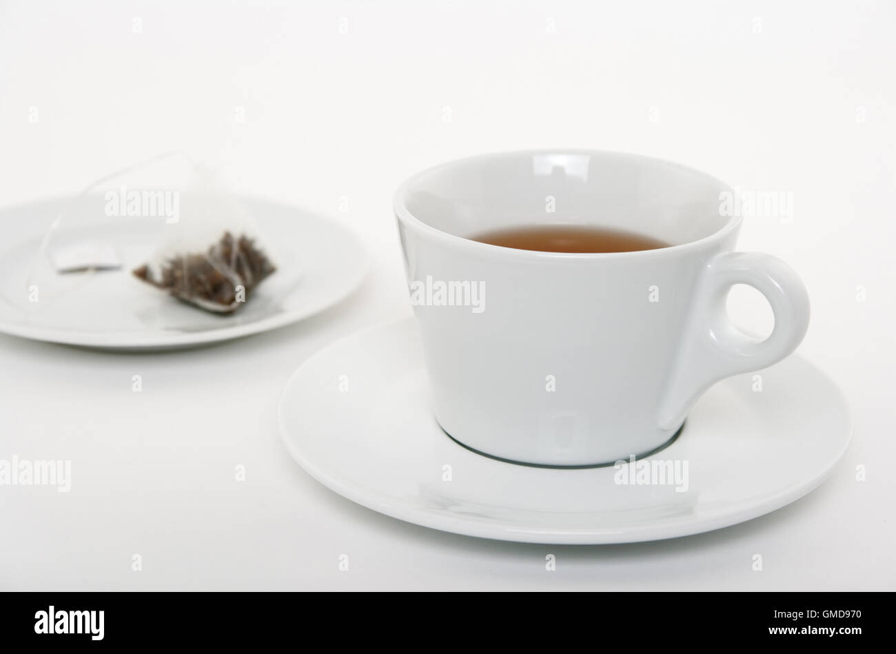 Cup of tea and used teabag Stock Photo - Alamy