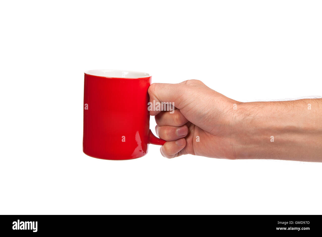 Male hand is holding a red cup Stock Photo - Alamy