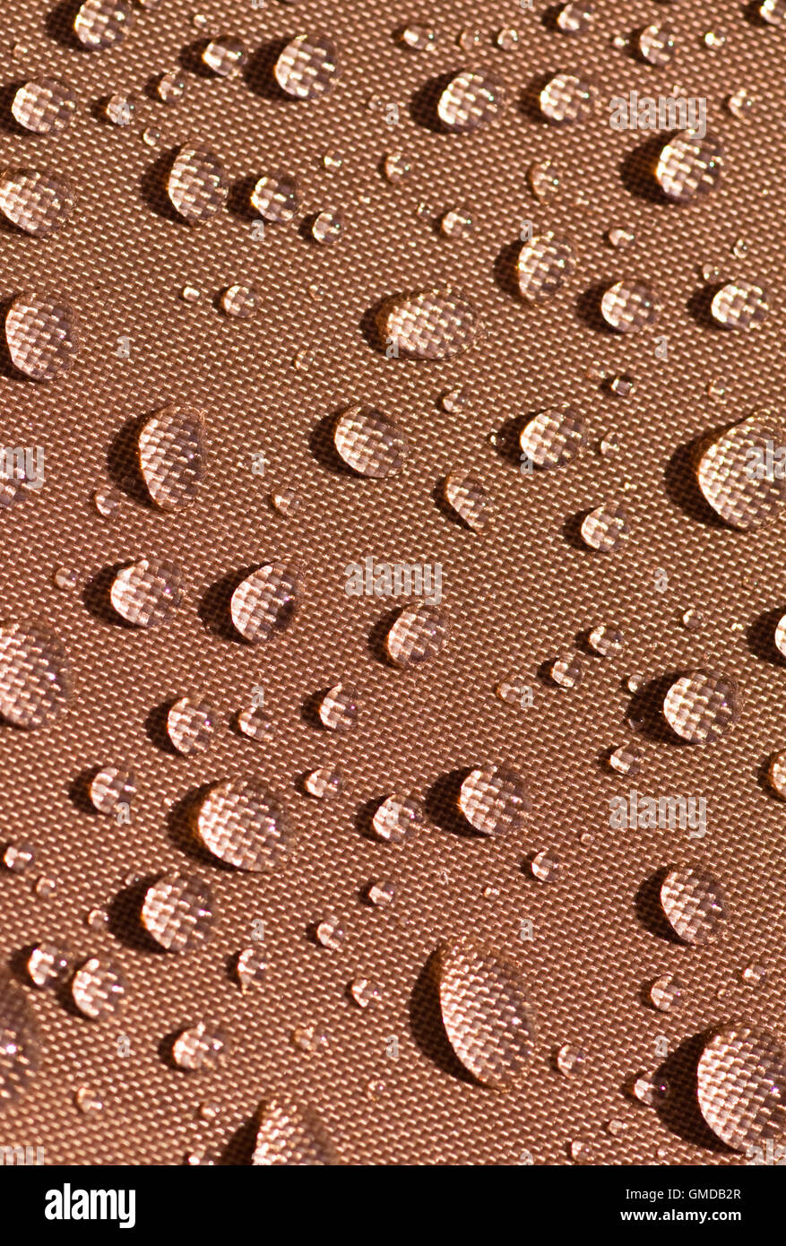 Droplets on brown fabric Stock Photo - Alamy