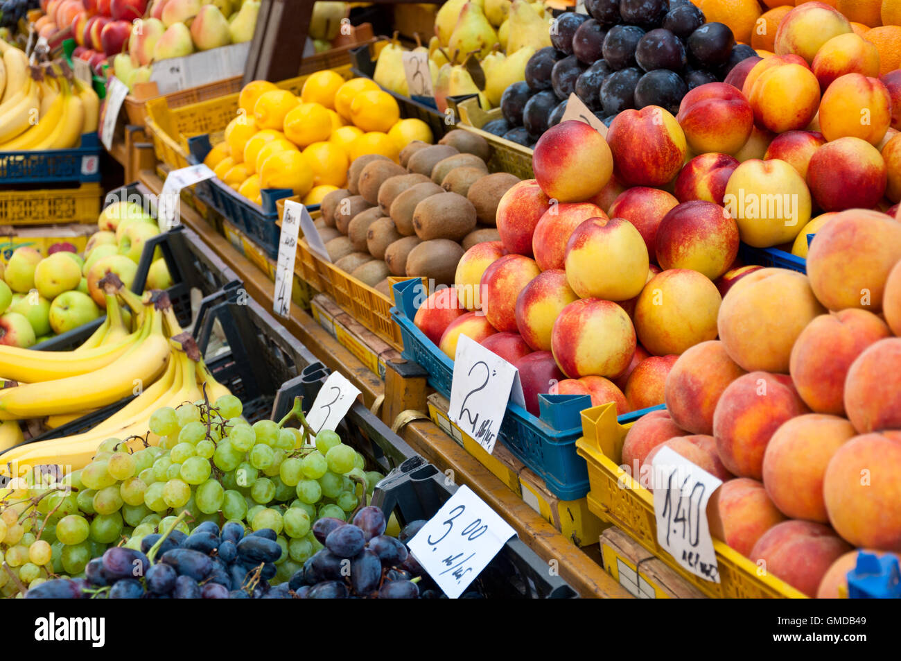 Fruit at market with price tags for sale Stock Photo - Alamy