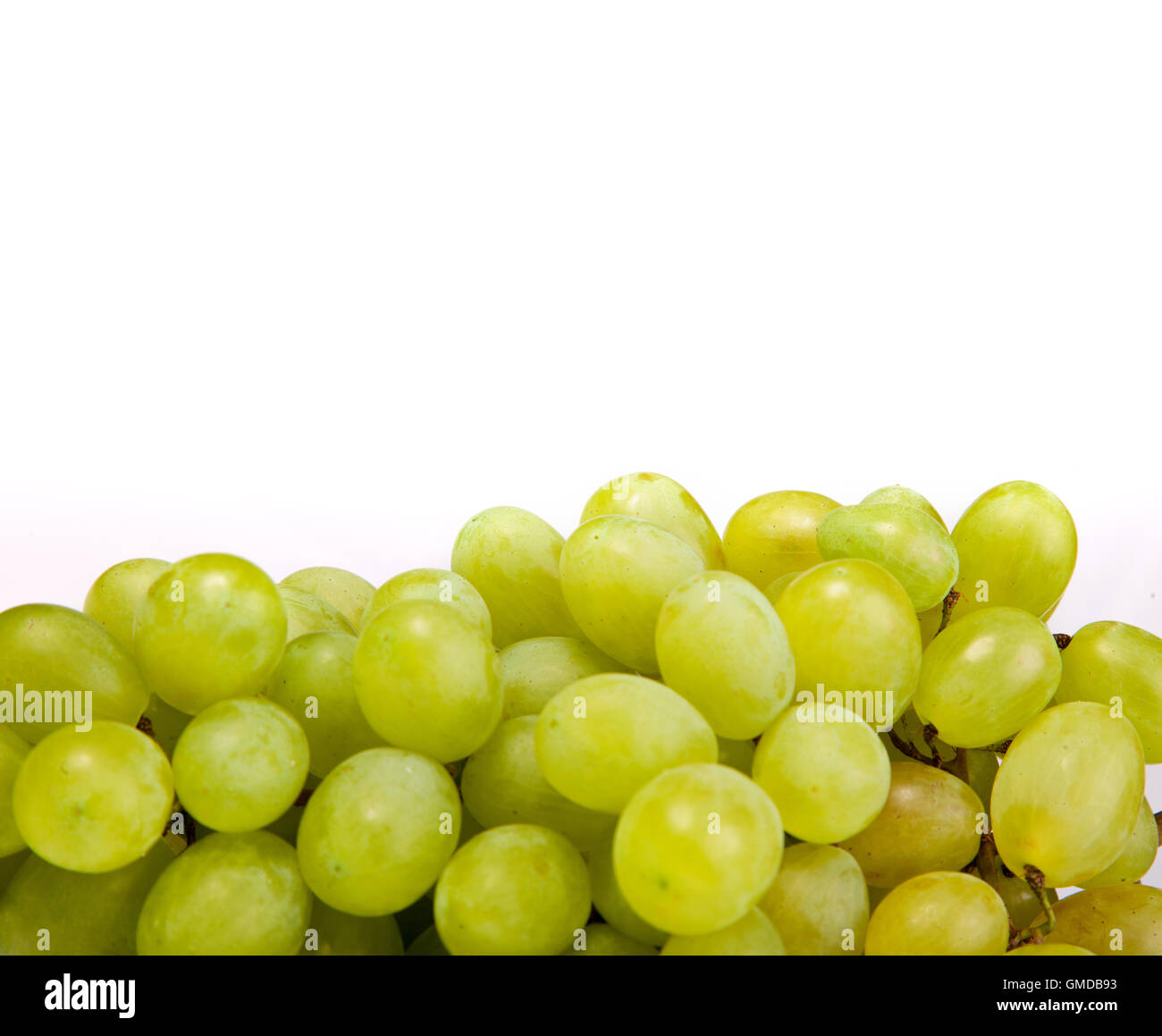 Bunch of Green Grapes laying isolated Stock Photo - Alamy