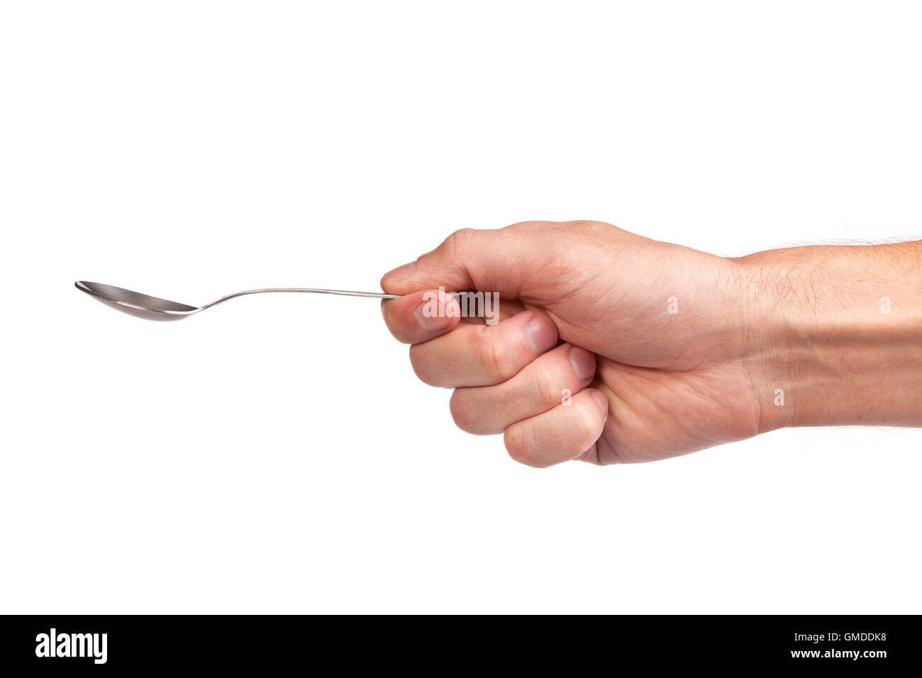 Hand is holding a spoon isolated Stock Photo - Alamy