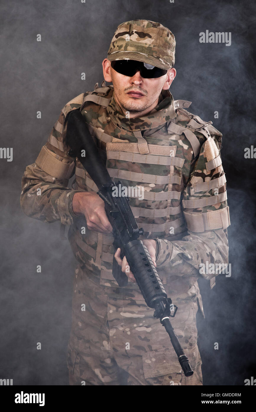Modern soldier with rifle Stock Photo - Alamy