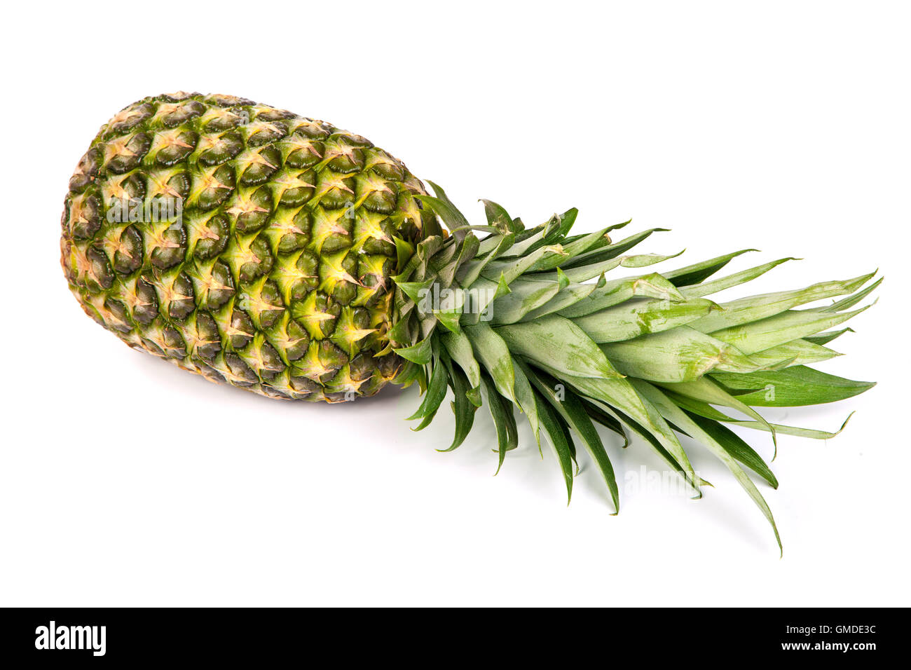 Single pineapple isolated on white Stock Photo - Alamy