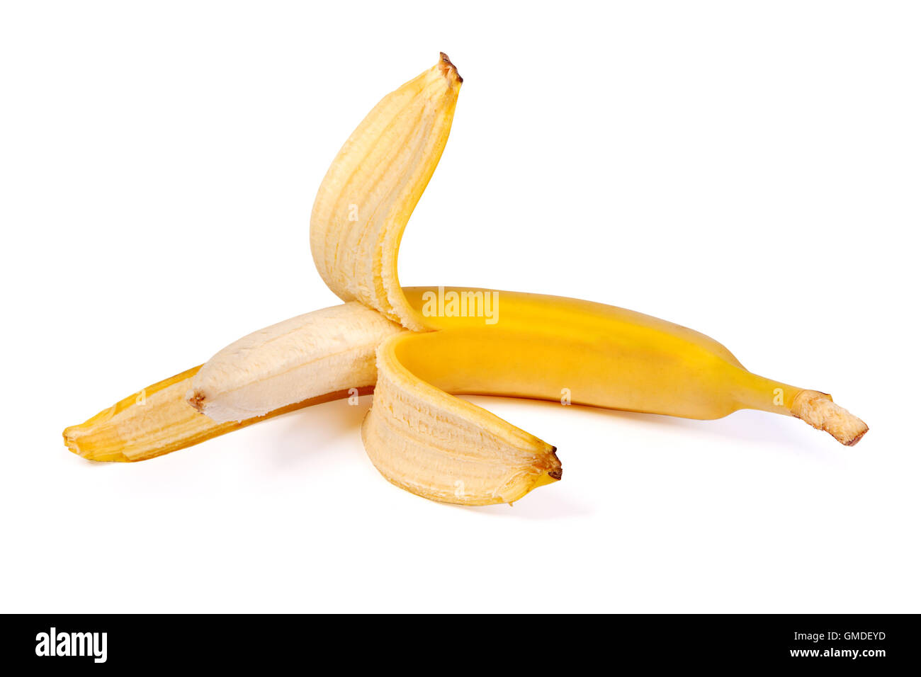 Open banana on white background Stock Photo - Alamy